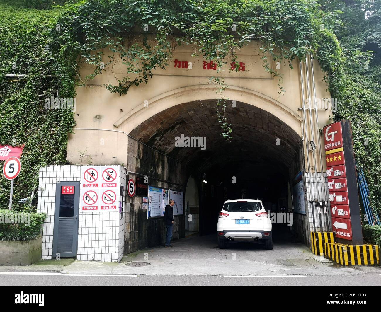 A gas station with 6 fuel dispensers are built in a air-raid shelter ...