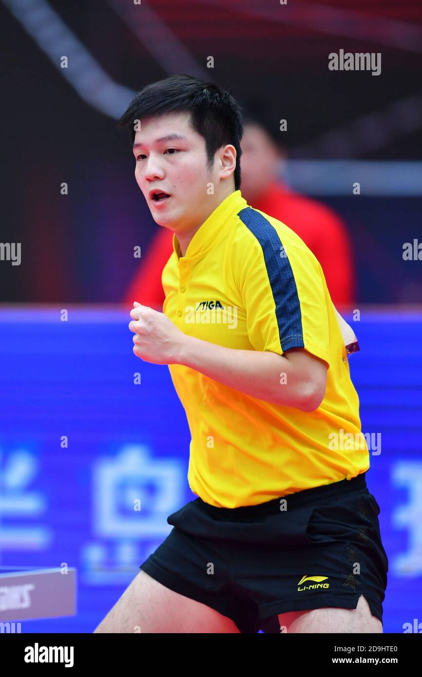 Chinese table tennis player Fan Zhendong competes against Chinese table ...