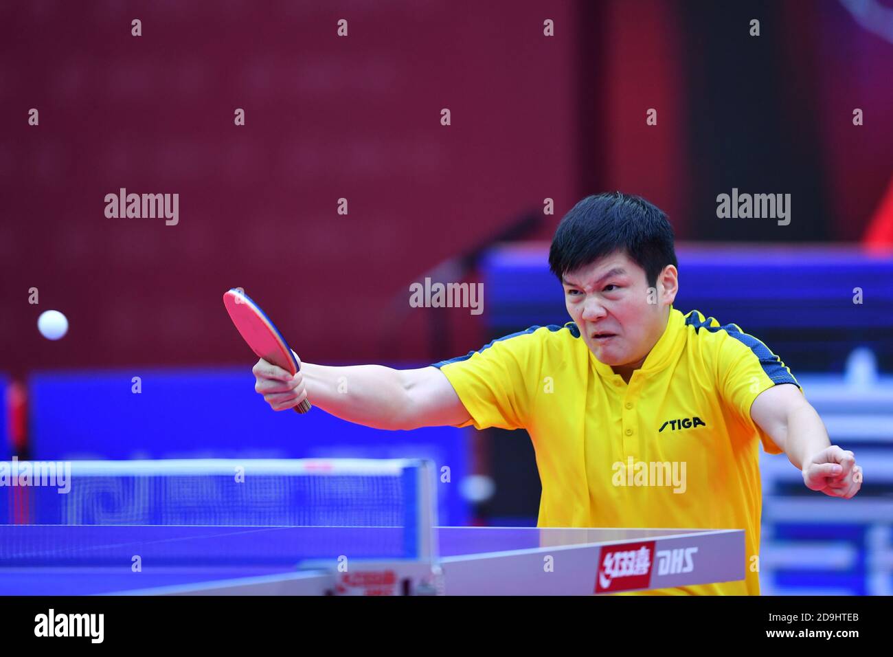 Chinese table tennis player Fan Zhendong competes against Chinese table ...
