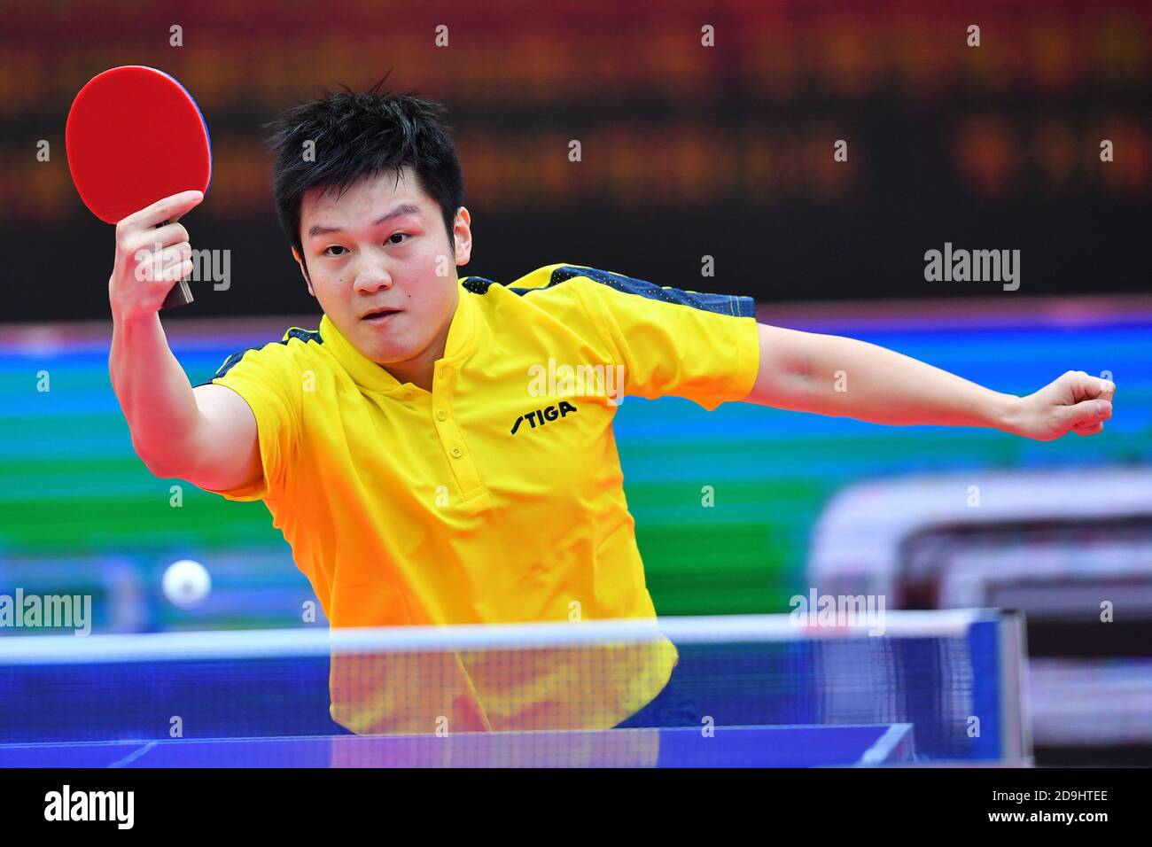 Chinese table tennis player Fan Zhendong competes against Chinese table ...