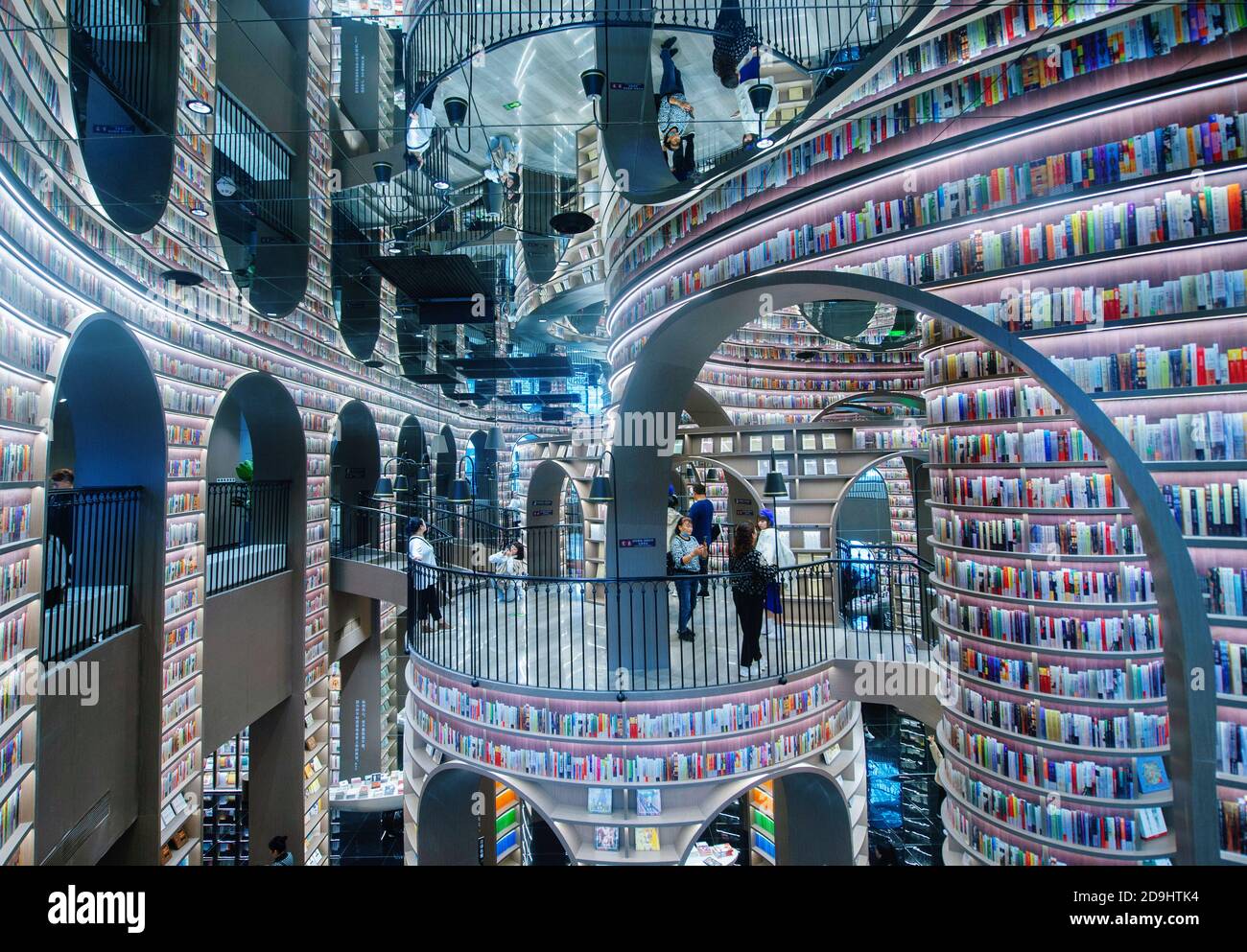Citizens wander inside the newly opened Zhongshuge bookstore, seeking ...