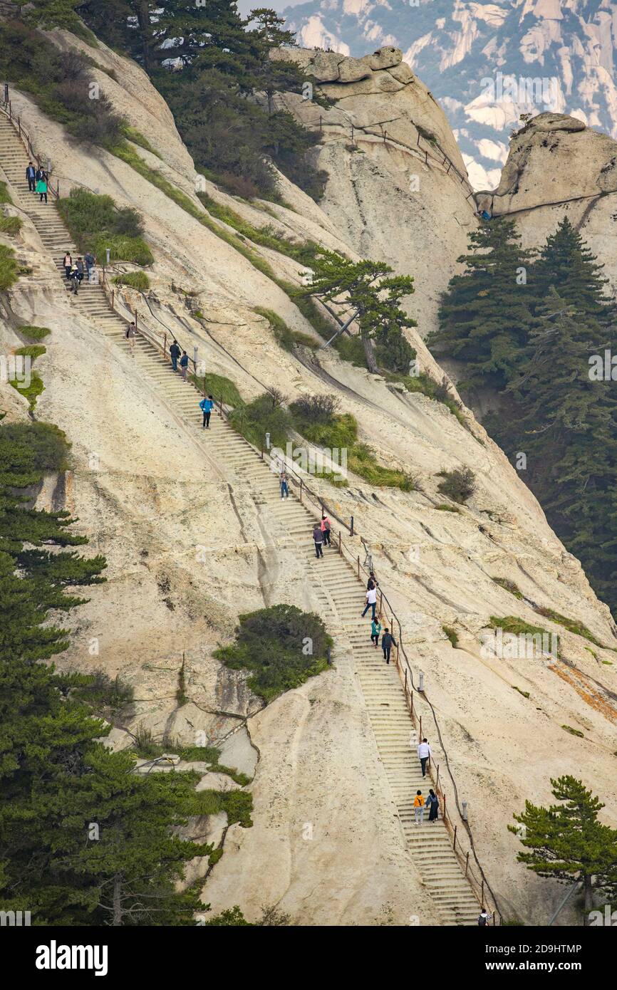 Tourists climb the Mount Hua, the western mountain of the Five Great ...