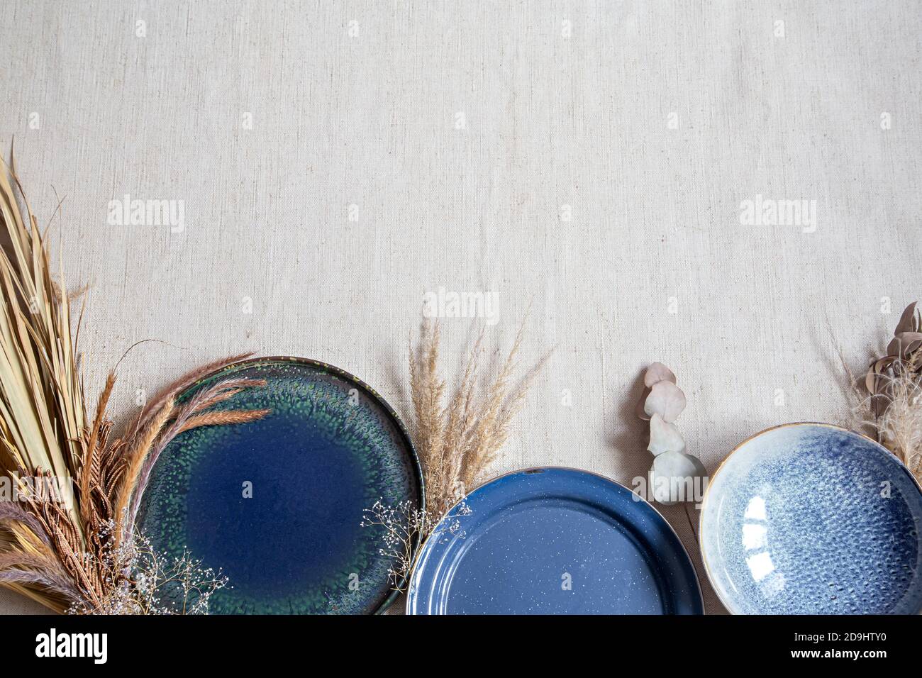 Light background with ceramic dishes beautiful layout. The view from ...