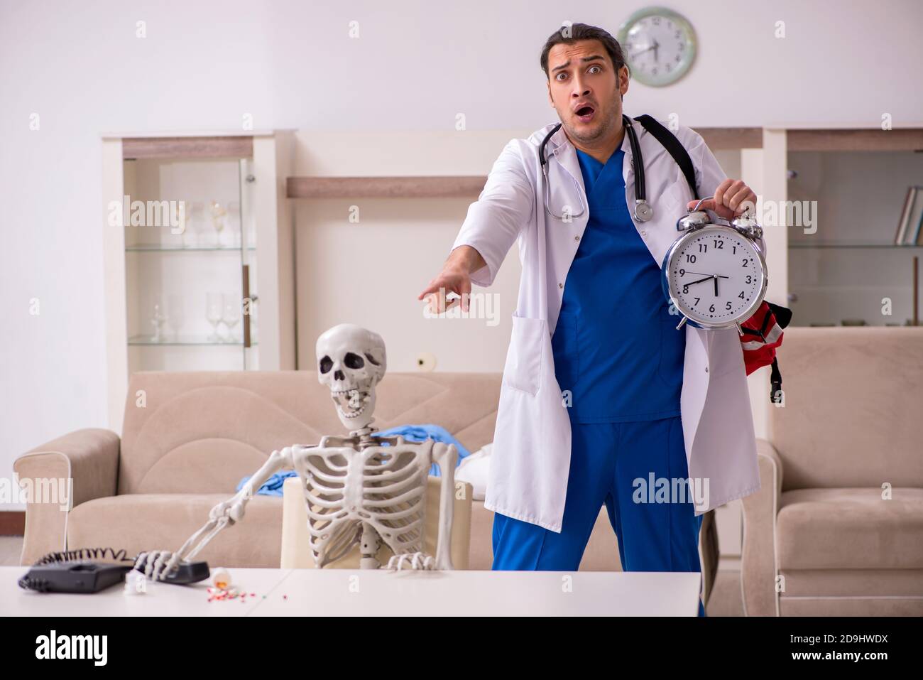 Male paramedic visiting skeleton patient Stock Photo - Alamy
