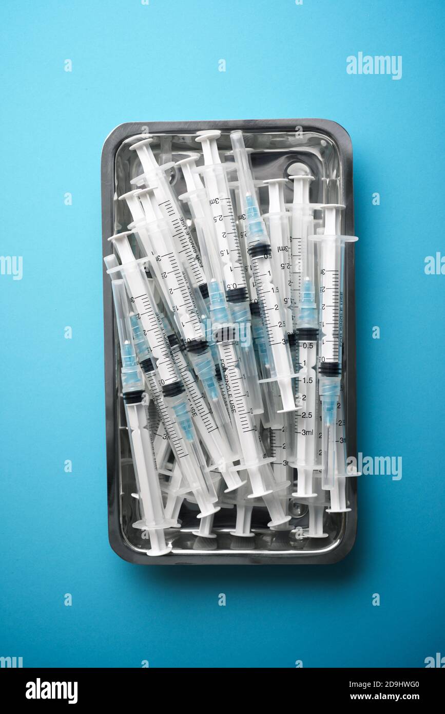 Group of syringes on a metal tray Stock Photo - Alamy