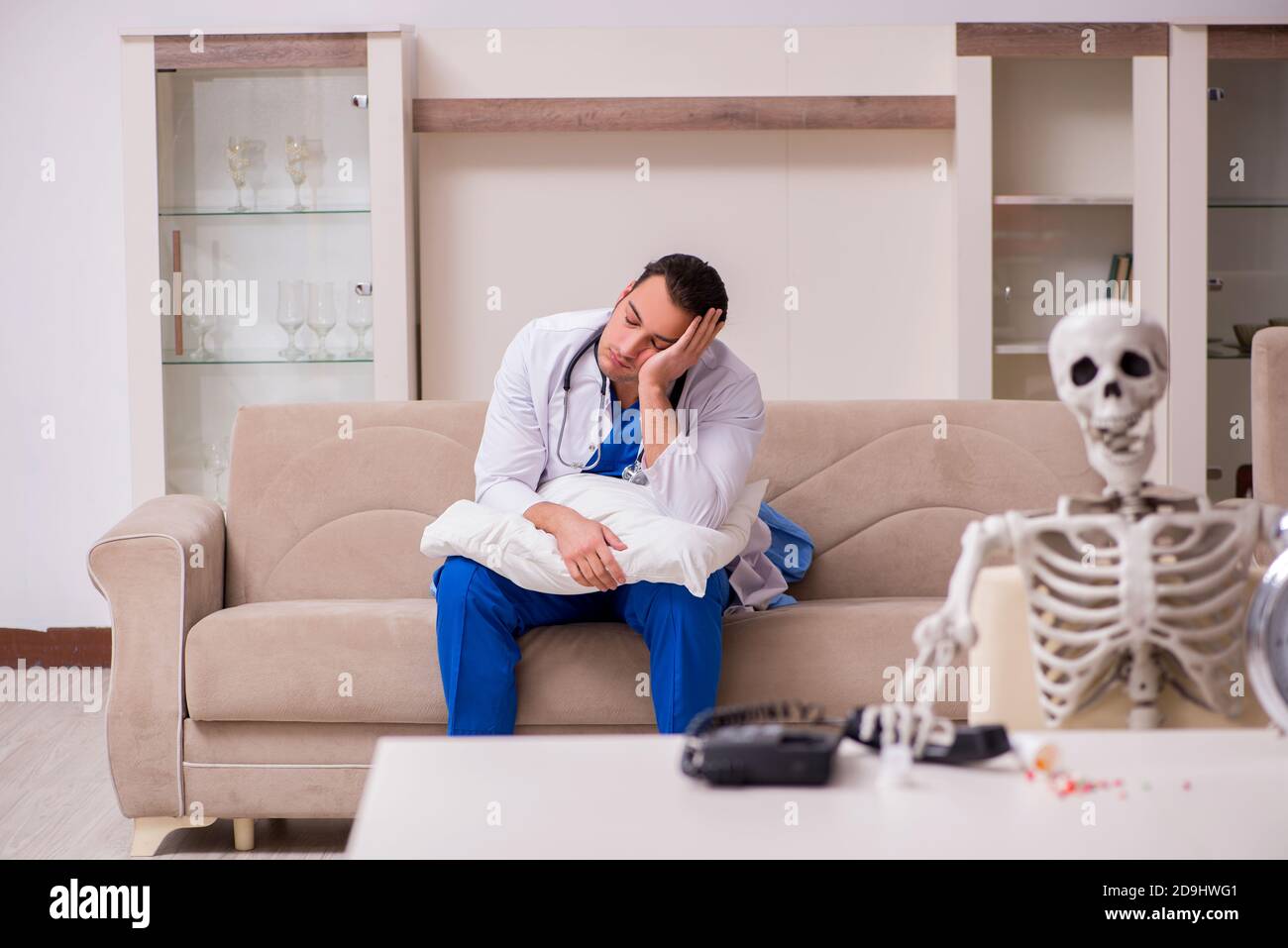 Male paramedic visiting skeleton patient Stock Photo - Alamy
