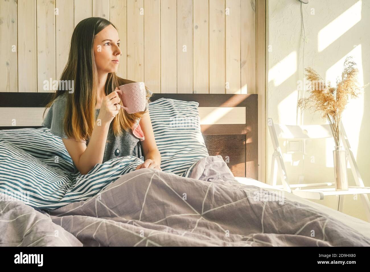 Young woman sun bed hi-res stock photography and images - Alamy