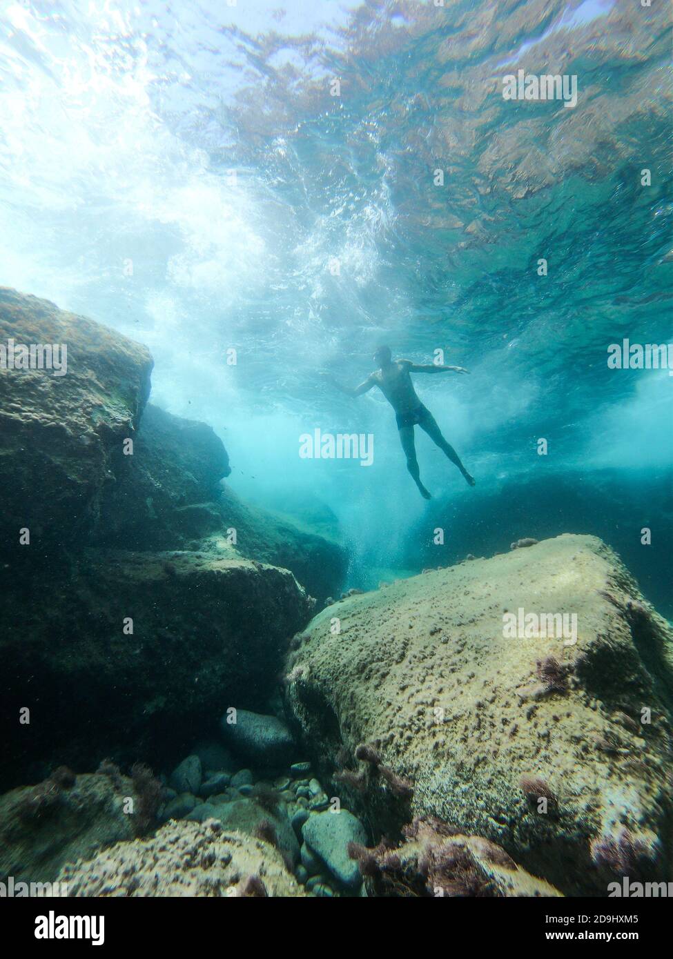 Underwater view man swimming deep hi-res stock photography and images ...