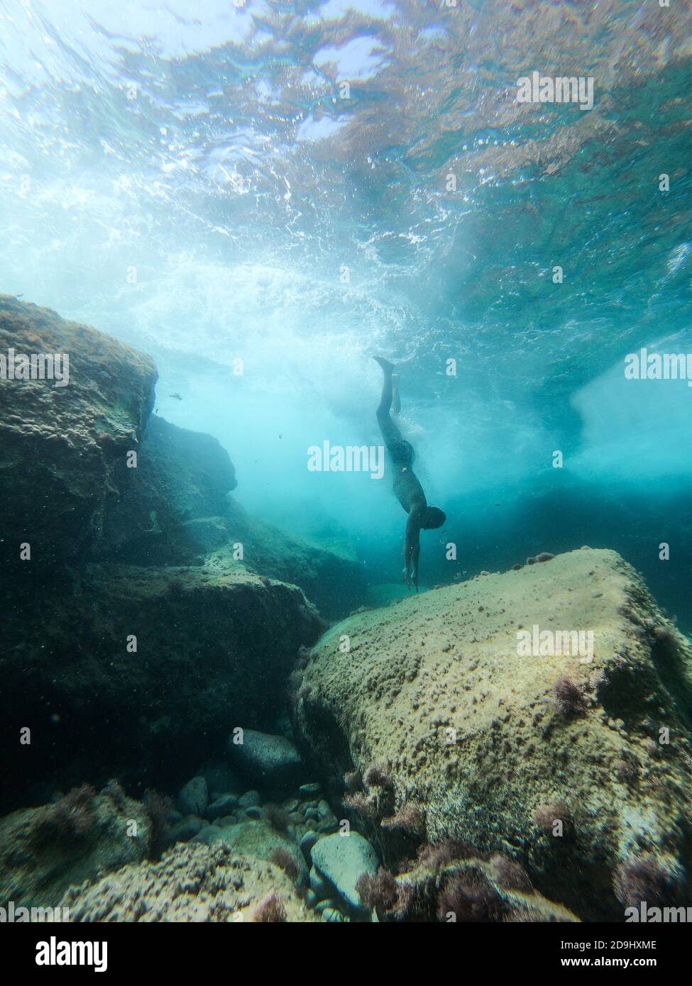 Underwater view man swimming deep hi-res stock photography and images ...