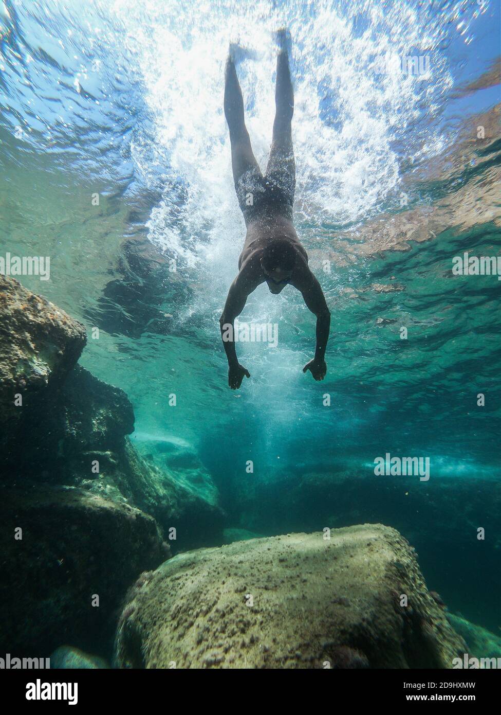 Person Diving Into Ocean