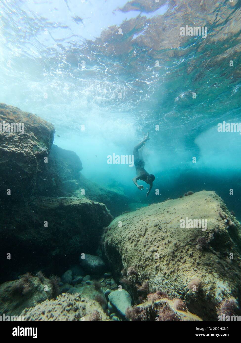 Man diving into the sea. View from inside the water Stock Photo - Alamy
