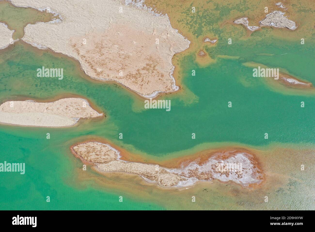 Aerial view of the °most beautiful highway over lake" in Dachaidan Town ...