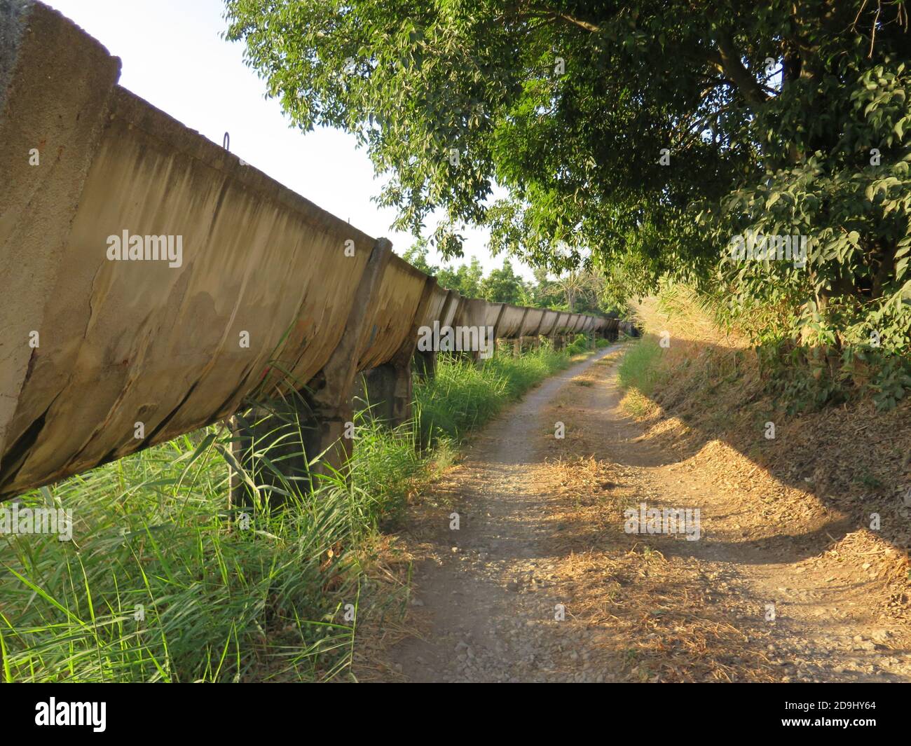 Elevated Concrete irrigation canal winding through countryside near ...