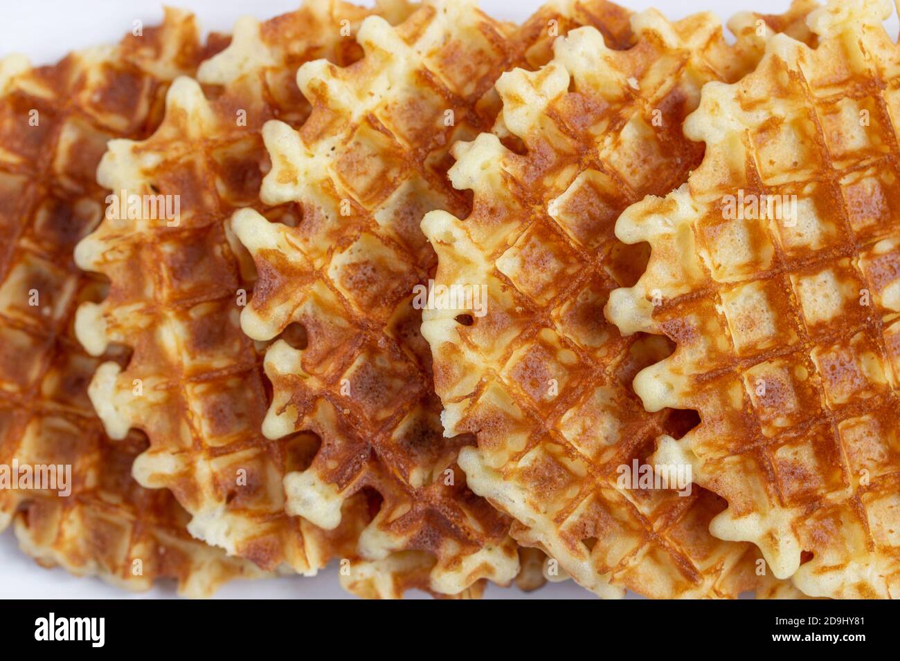 Viennese waffles close-up, homemade baked geometric biscuits, round ...