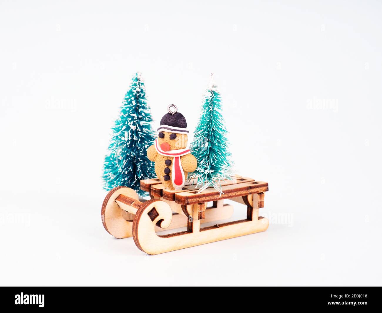 Toy in the shape of a Christmas tree, gingerbread cookie. toy snowman ...