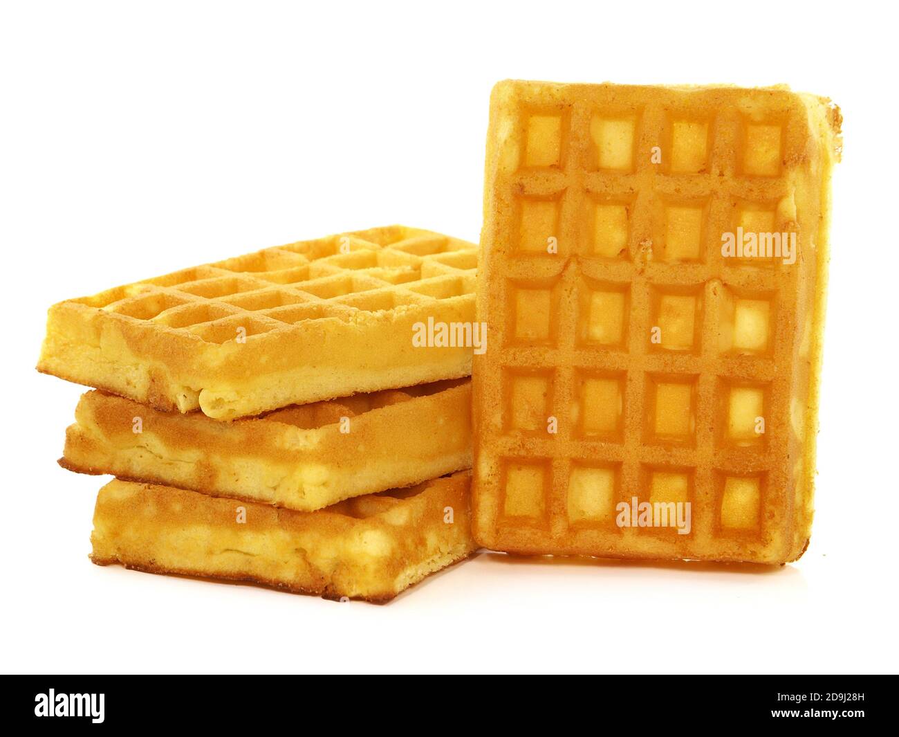Stack of baked waffles isolated on white Stock Photo - Alamy