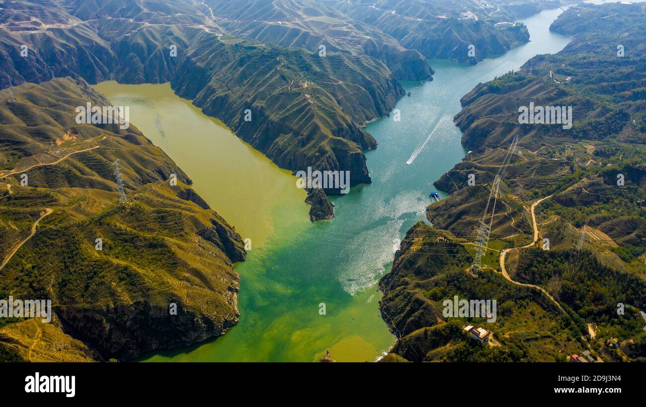 --File--Aerial view of the light green and dark green colors formed at ...