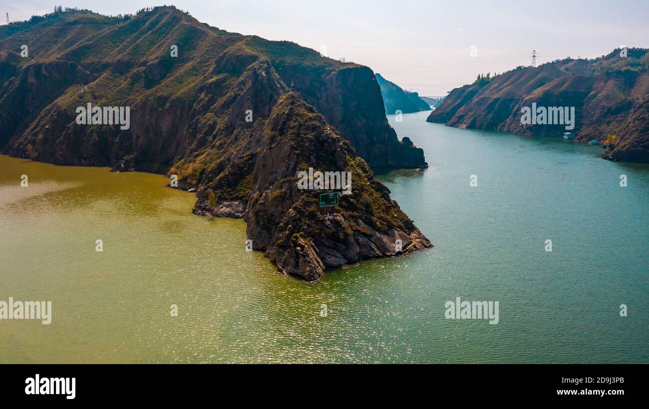 --File--Aerial view of the light green and dark green colors formed at ...