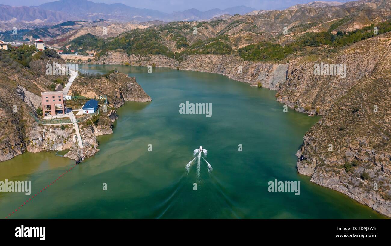 --File--Aerial view of the light green and dark green colors formed at ...