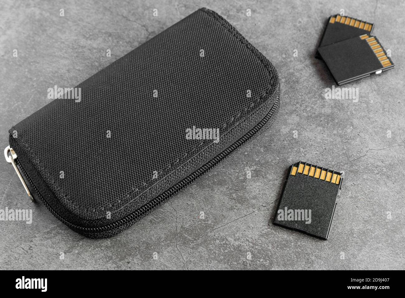 Sd memory cards for photography next to a card organizer Stock Photo ...