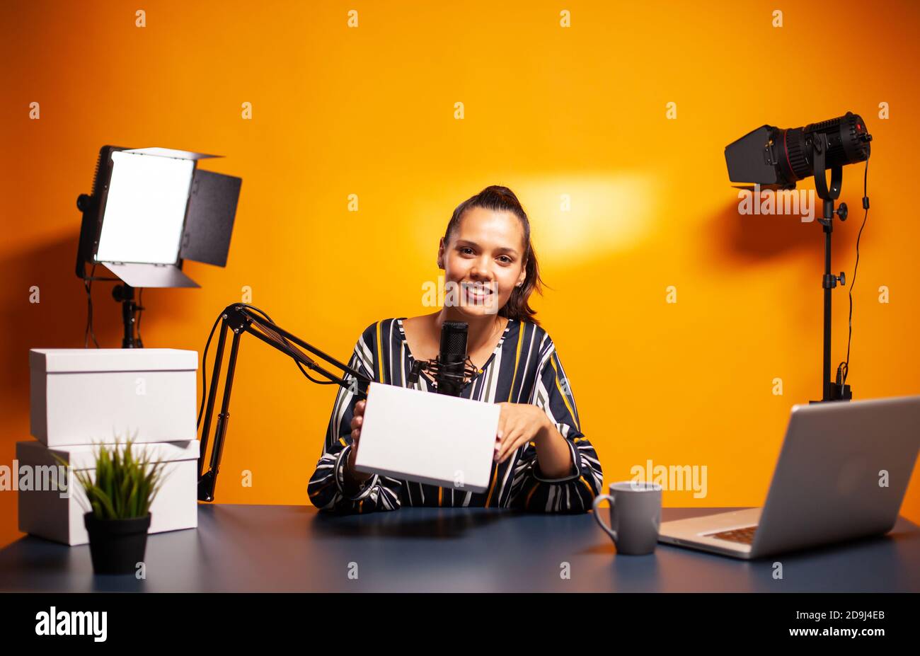 Famous creative woman recording giveaway from home studio. . Creative ...