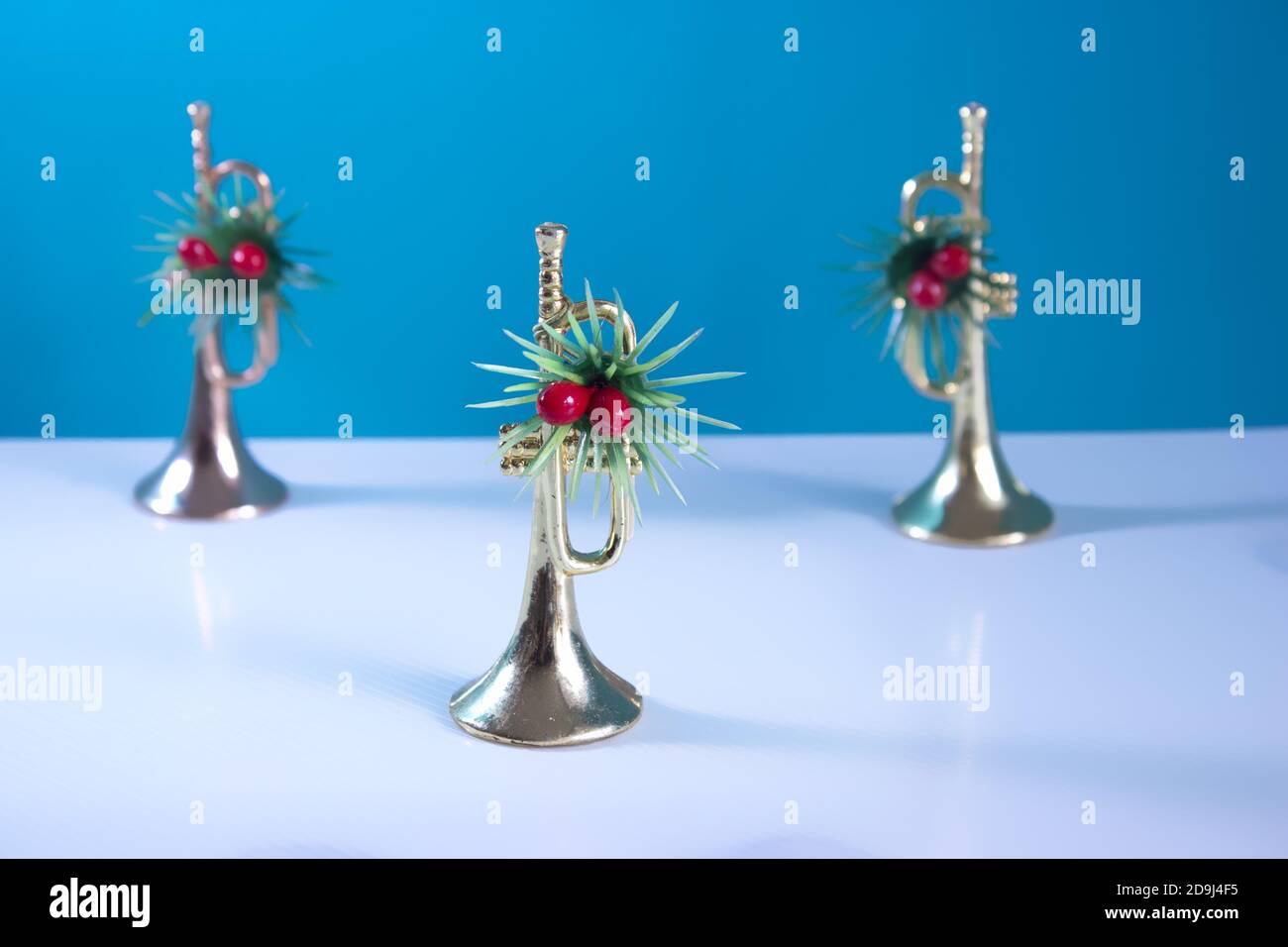 The trumpets festively decorated with a blue background. Christmas ...
