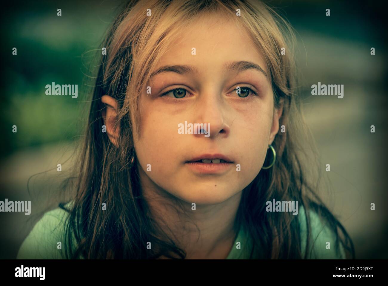 Beautiful sad little girl crying, on summer background. Girl crying ...