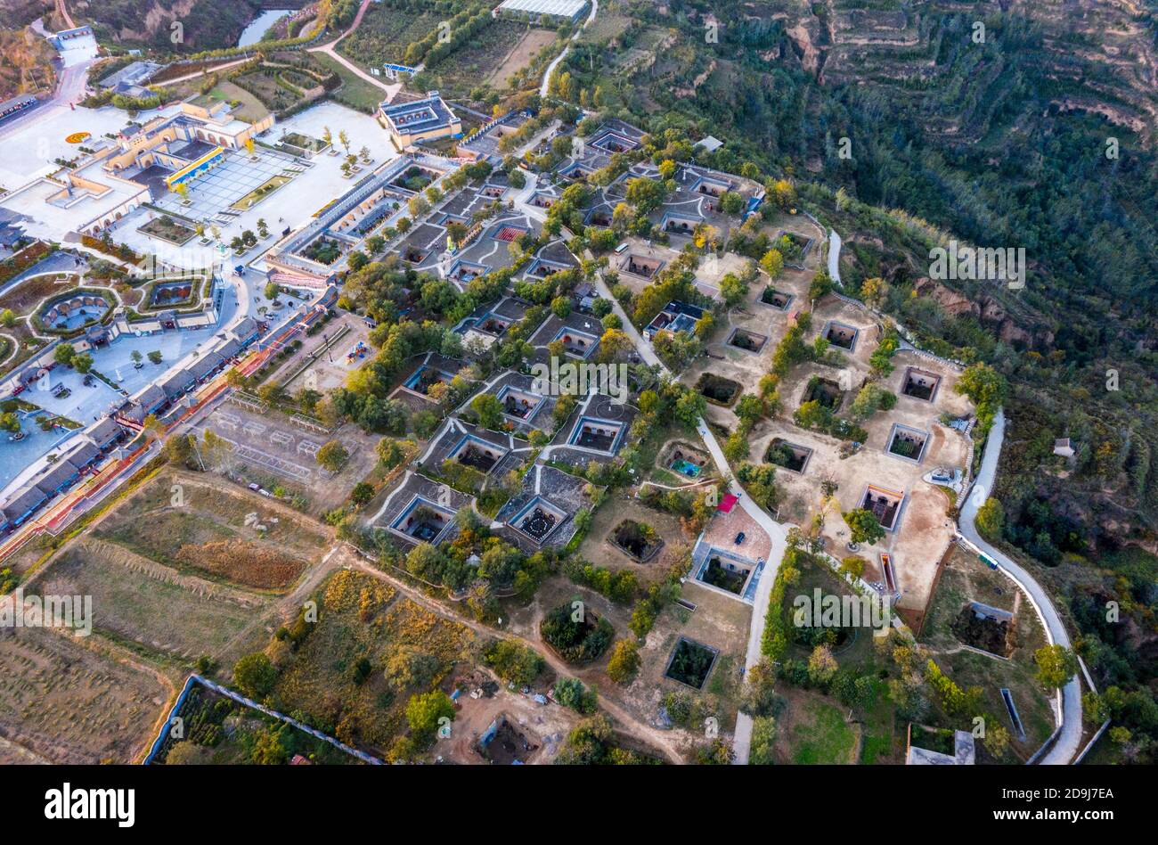 Aerial view of sunken courtyard houses, a type of house with a history ...