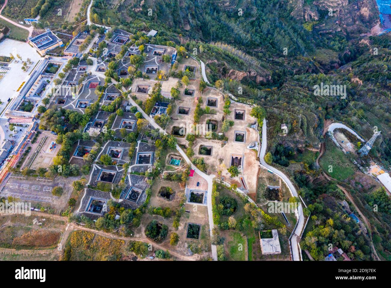 Aerial view of sunken courtyard houses, a type of house with a history ...