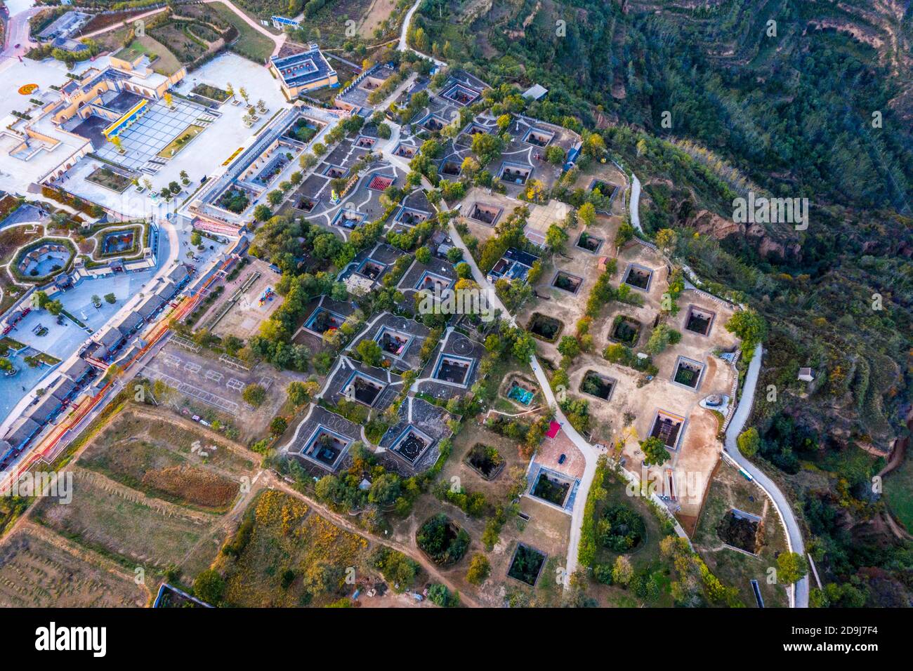 Aerial view of sunken courtyard houses, a type of house with a history ...