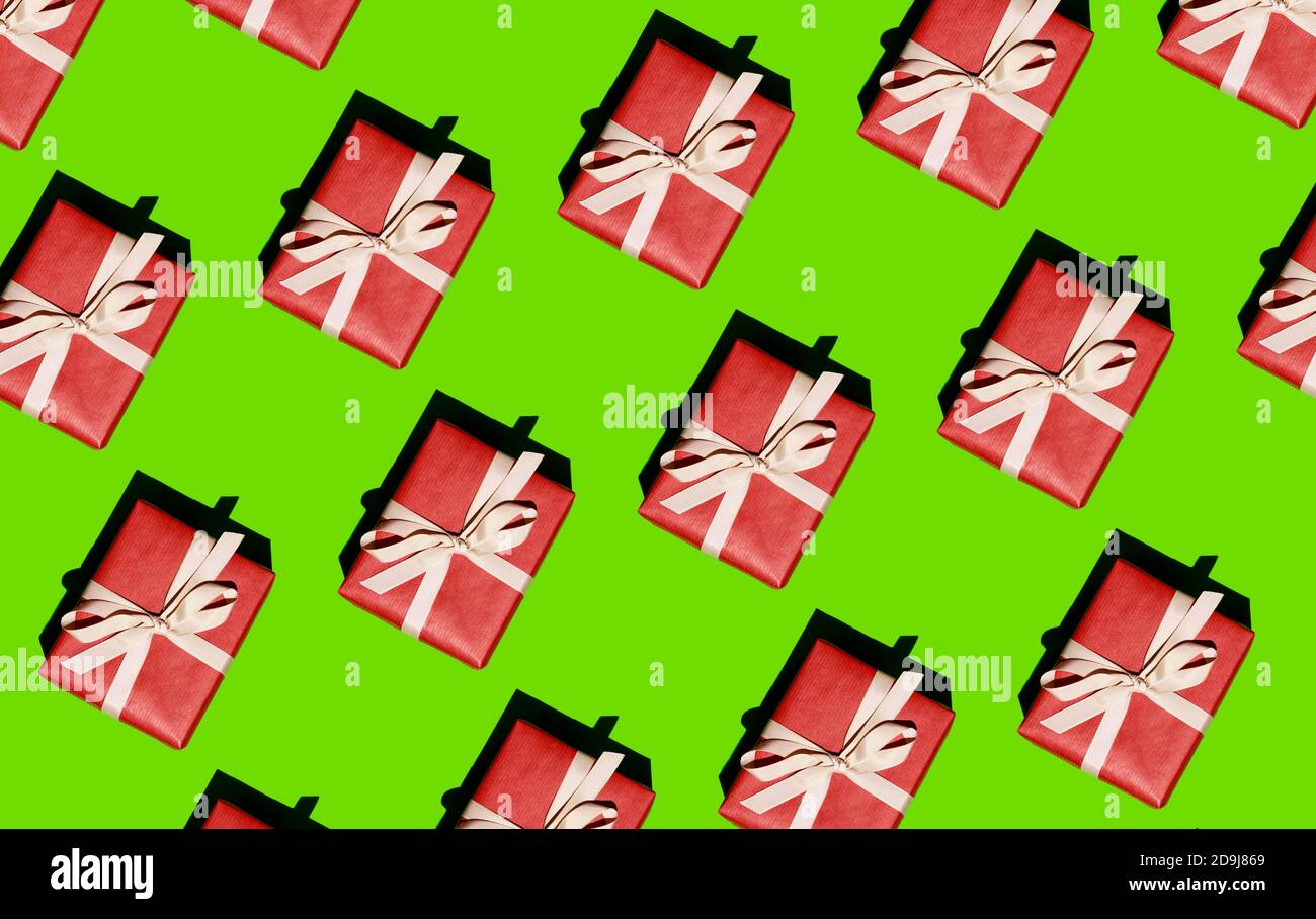 Christmas pattern - a pattern from a red box tied with a white ribbon ...