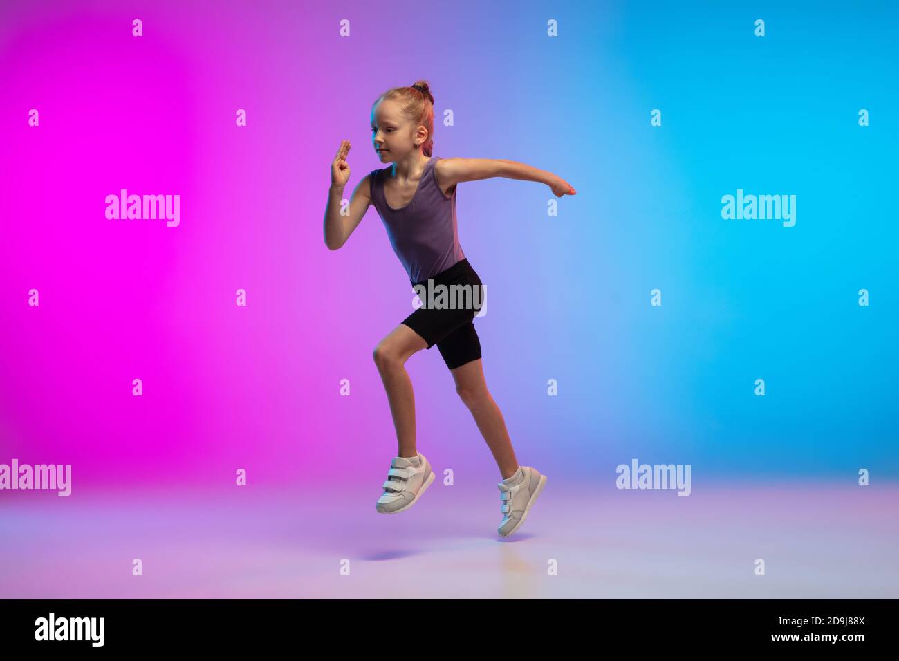 Healthy. Teenage girl, professional runner, jogger in action, motion ...