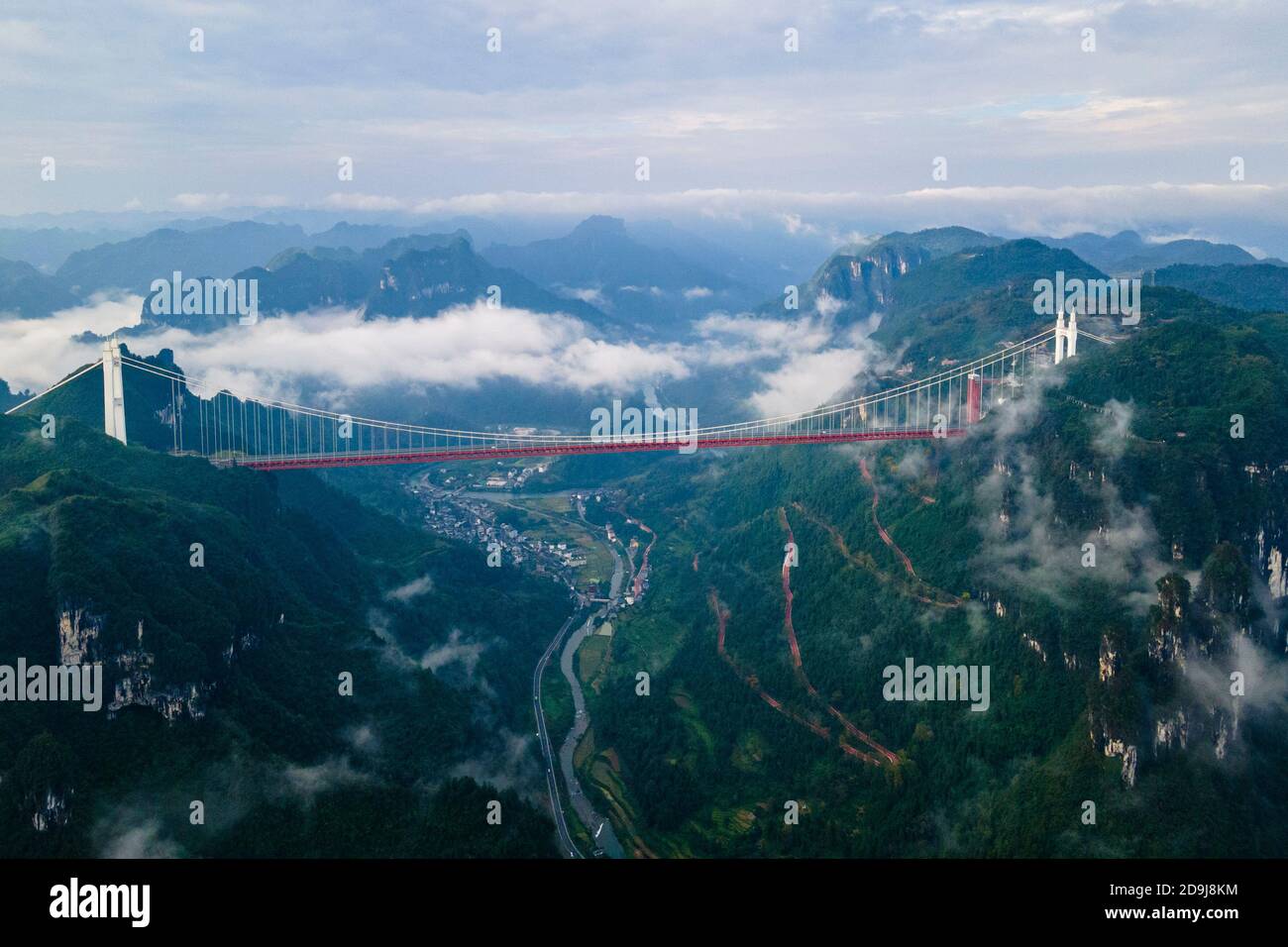 The sea of clouds appears around the Aizhai Suspension Bridge in Aizhai ...