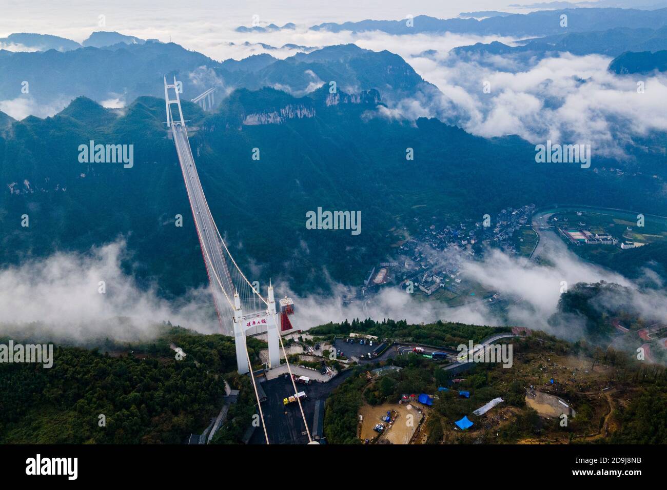 The sea of clouds appears around the Aizhai Suspension Bridge in Aizhai ...