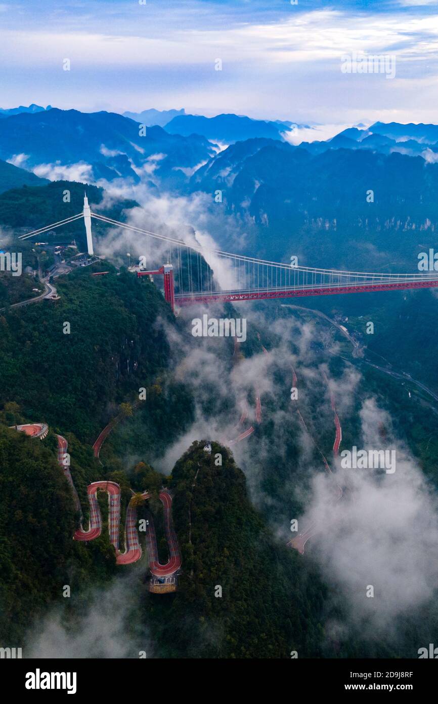 The sea of clouds appears around the Aizhai Suspension Bridge in Aizhai ...