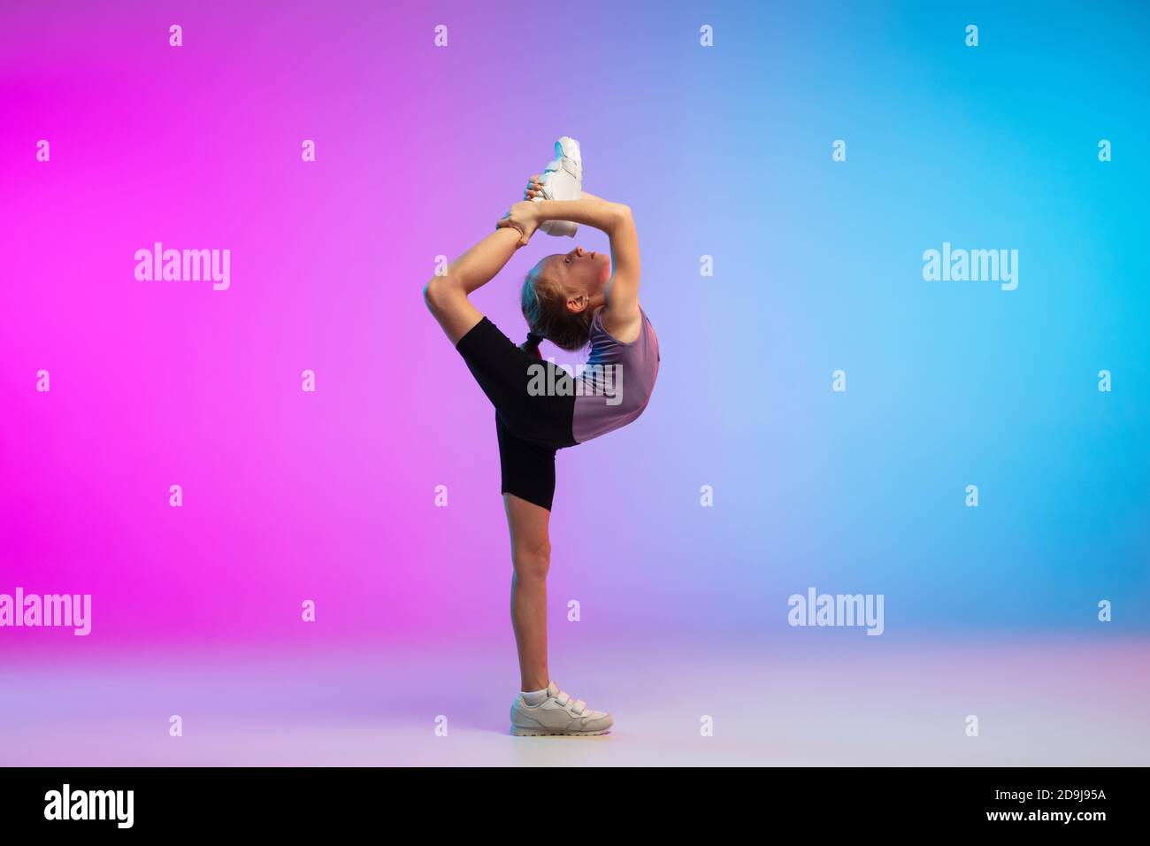 Flexible. Teenage girl, professional runner, jogger in action, motion ...