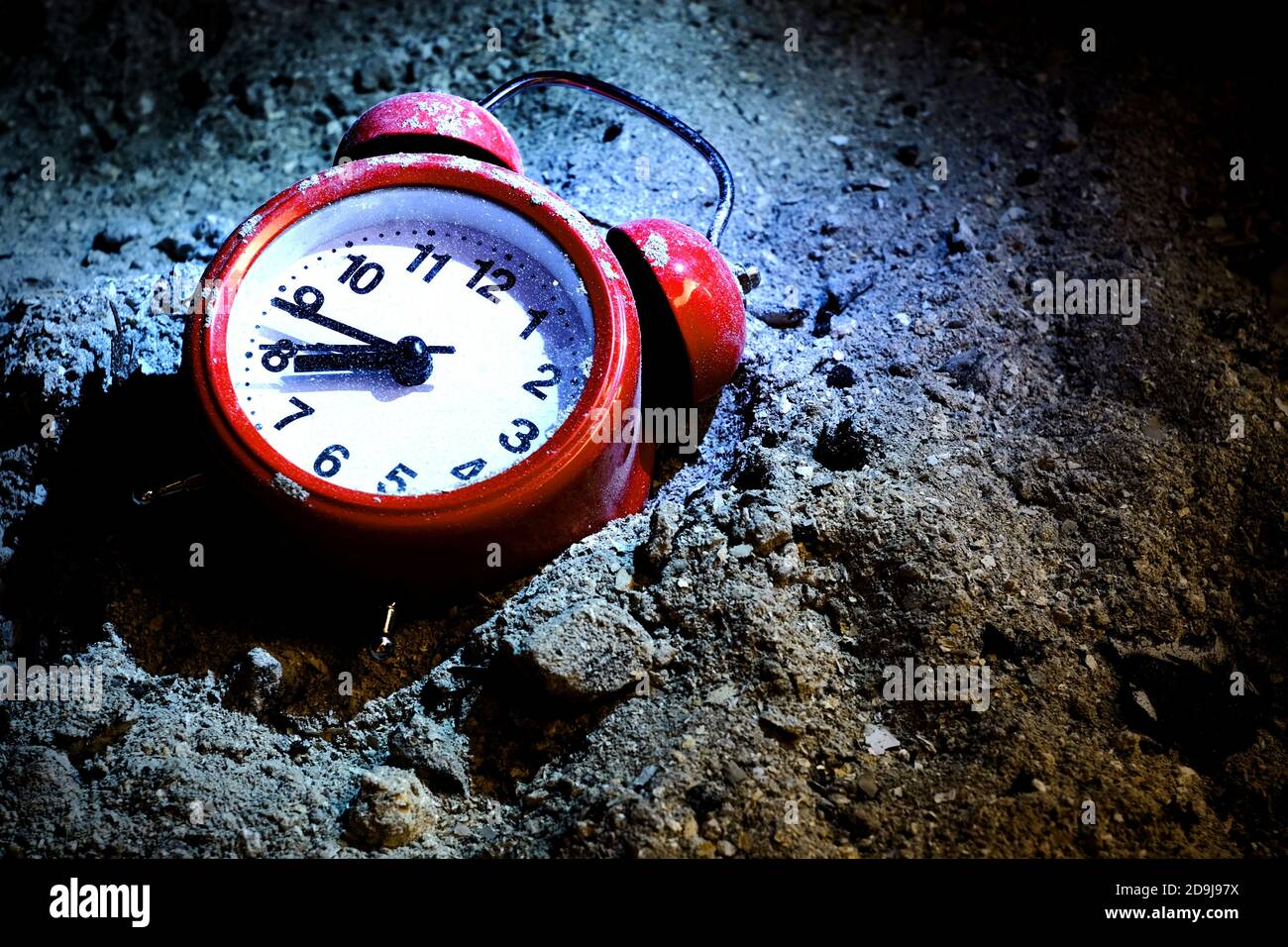 Retro style alarm clock in ash under the harsh spotlight Stock Photo ...
