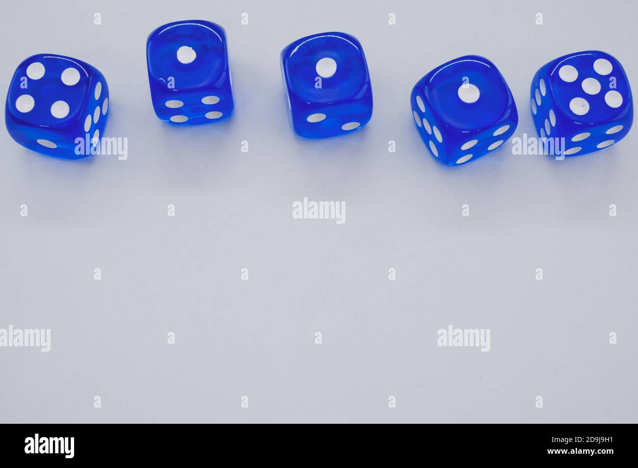 Top view of blue dice isolated on white background Stock Photo - Alamy