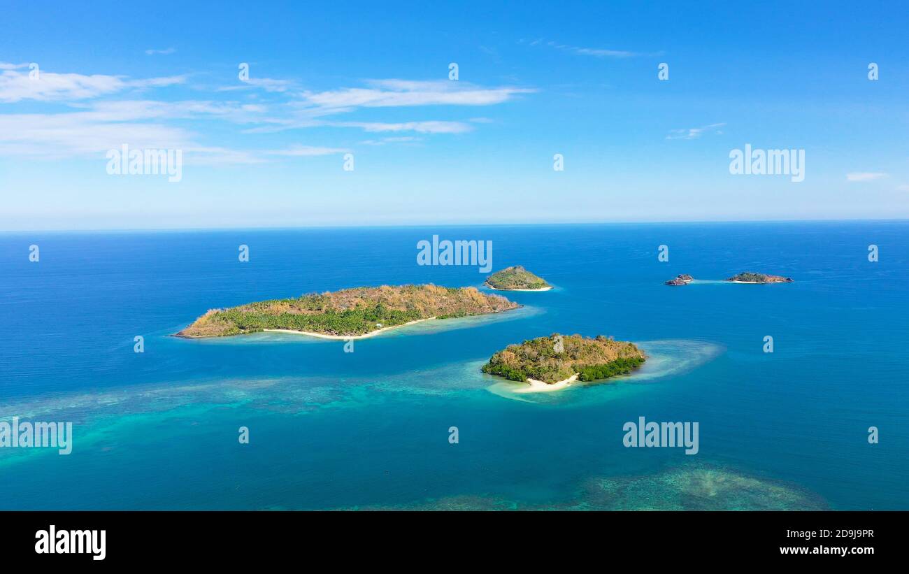 Tropical landscape: islands with beautiful sandy beaches by turquoise ...