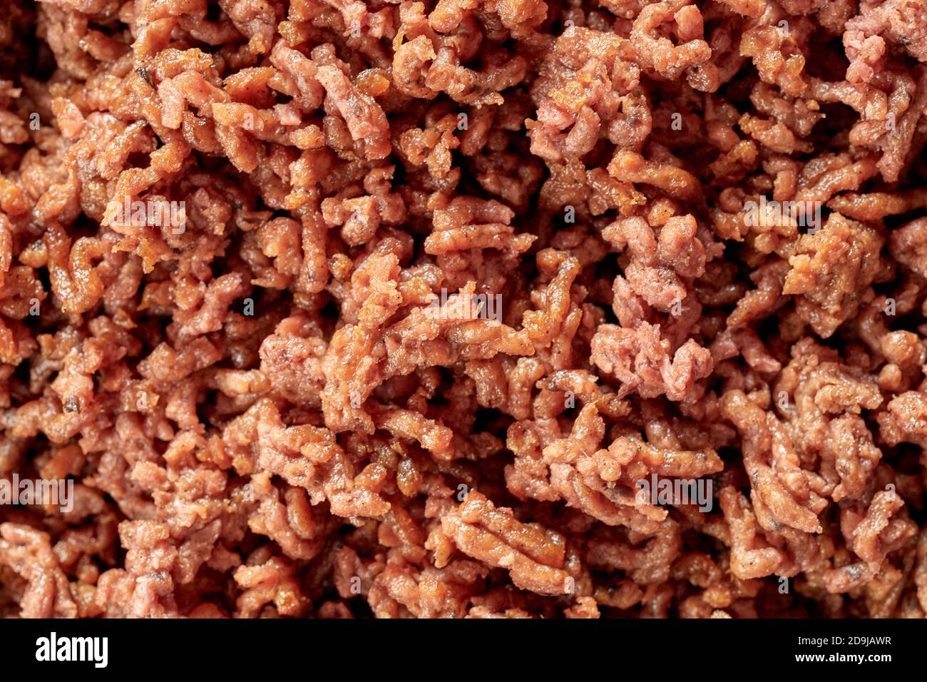 Background texture of raw plant based vegan mince meat in a close up ...