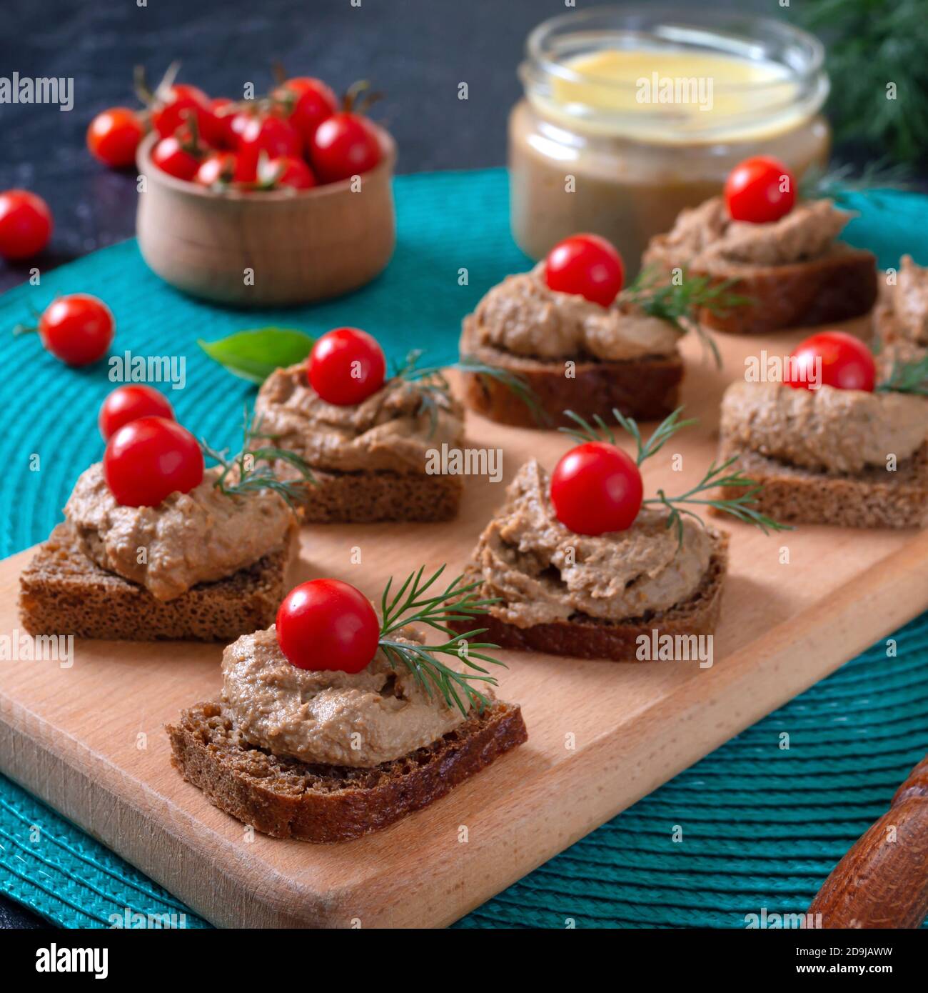 Canapes with rye bread, liver pate, cherry tomatoes. Breakfast snack ...