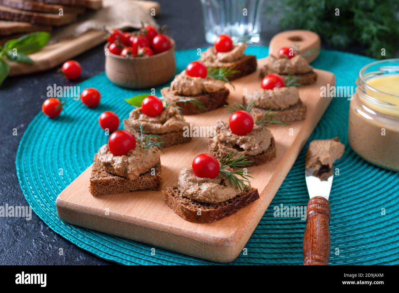 Canapes with rye bread, liver pate, cherry tomatoes. Breakfast snack ...