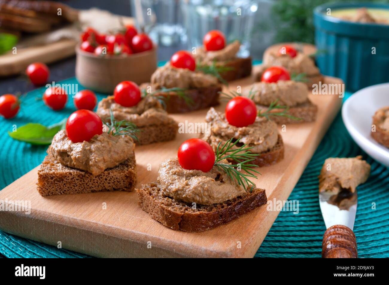 Canapes with rye bread, liver pate, cherry tomatoes. Breakfast snack ...