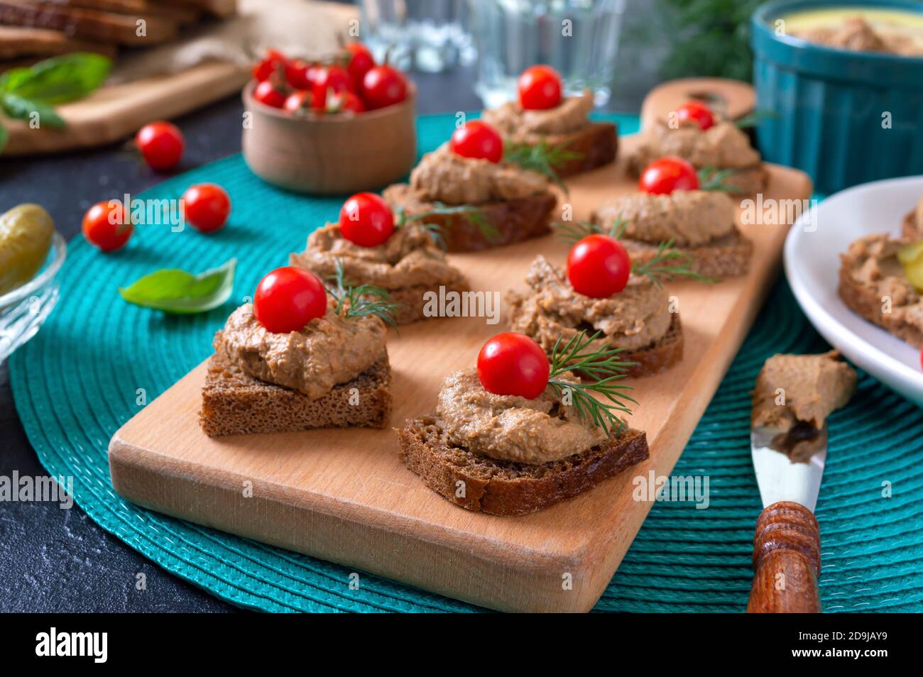 Canapes with rye bread, liver pate, cherry tomatoes. Breakfast snack ...
