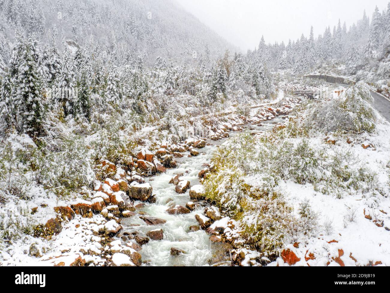 An aerial view of snow scenery of Ngawa Dagu Glacier Scenic Area in ...