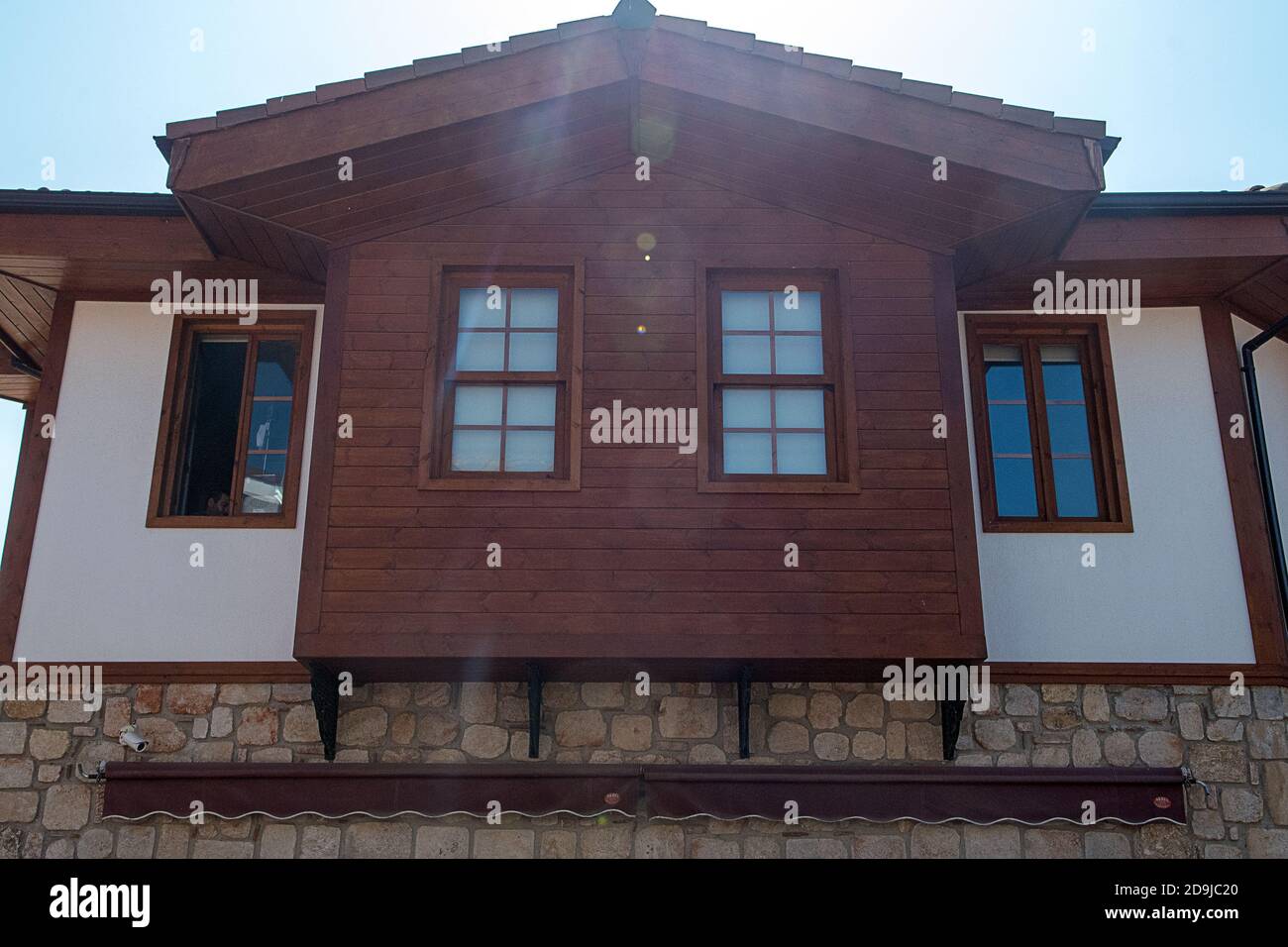 Traditional Windows with sprats on the facade of a building in side ...