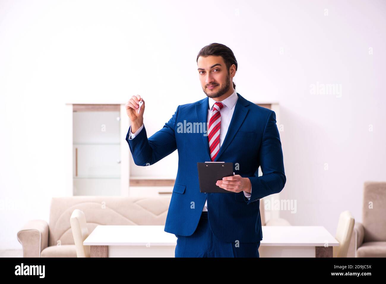 Male realtor presenting showing hi-res stock photography and images - Alamy