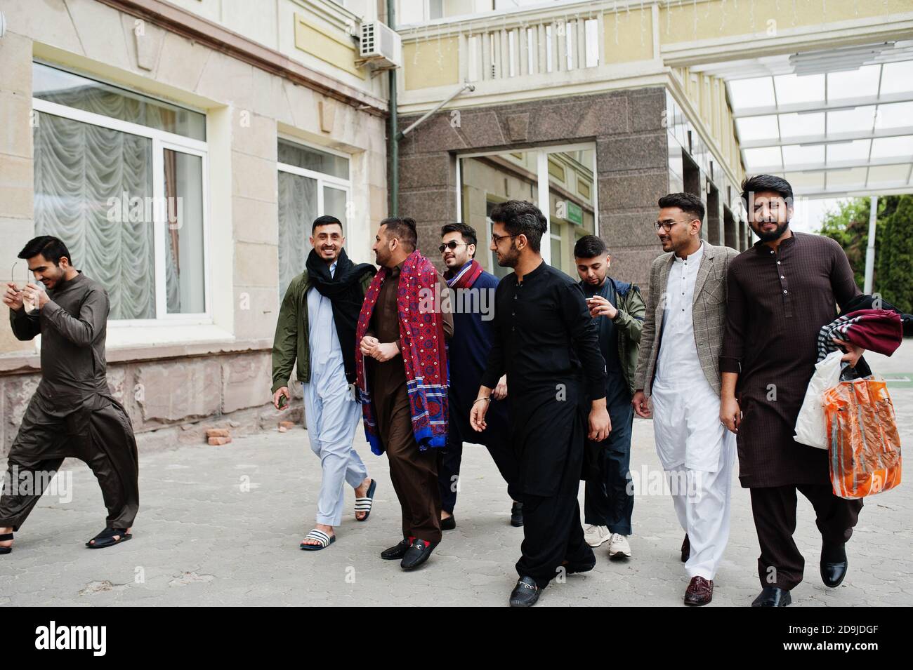 Group of pakistani man wearing traditional clothes salwar kameez or ...