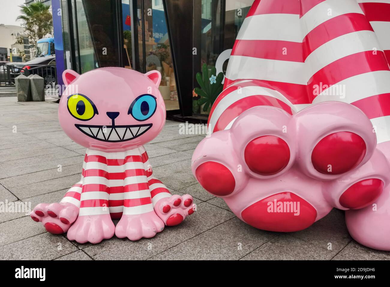 A giant Kuncat model is set up by the gate of a shopping mall to ...