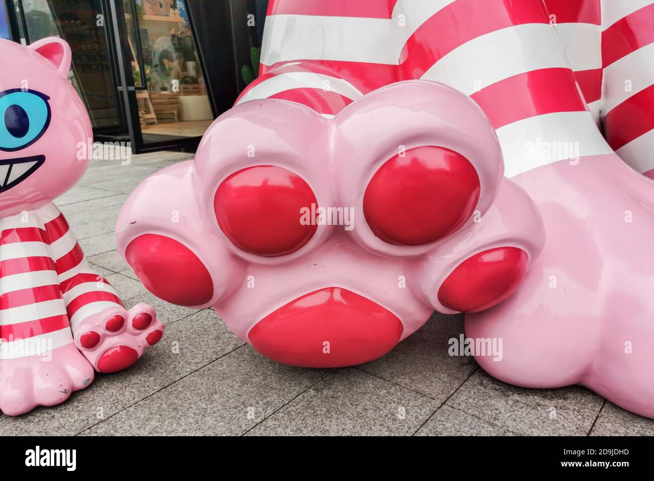 A giant Kuncat model is set up by the gate of a shopping mall to ...